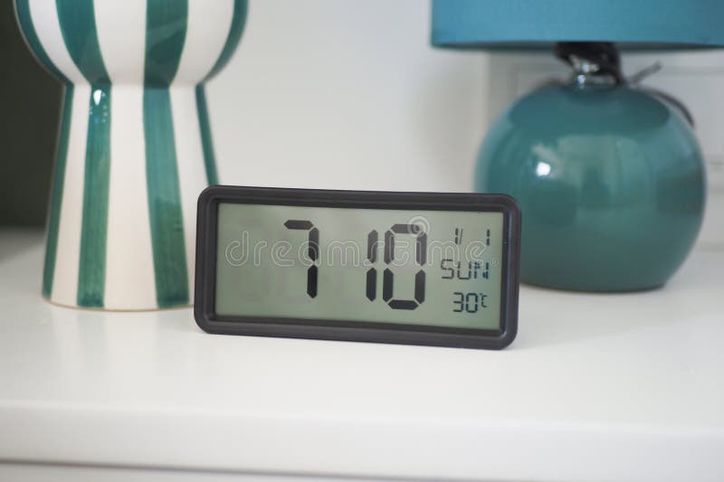 A Vibrant Decorative Arrangement Featuring a Modern Clock Surrounded by ...