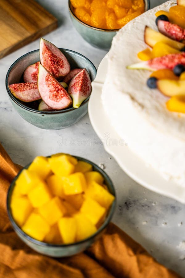 Fresh Figs, Mango Cubes, and Cake on Marble. Stock Image - Image of ...