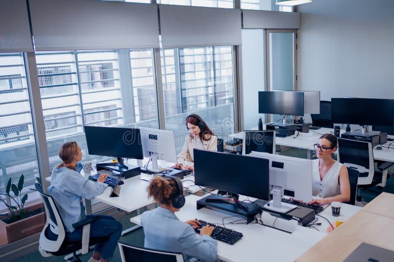 Modern Office Collaboration Features Professionals Actively Working at ...