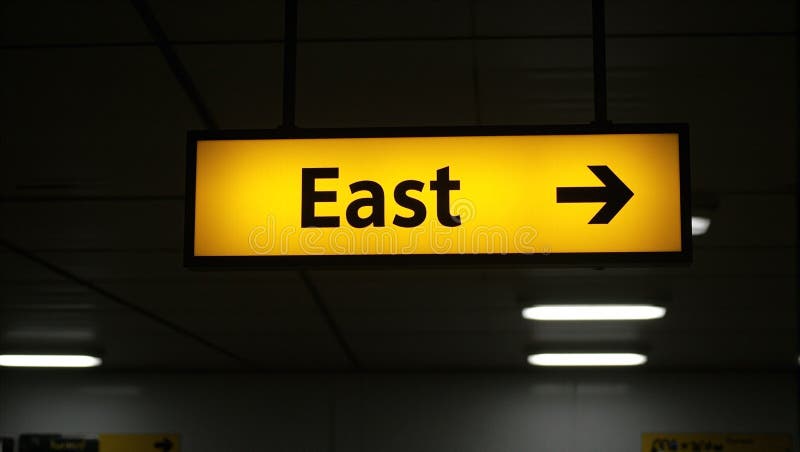 Vibrant East Sign with Arrow at Train Station Stock Illustration ...