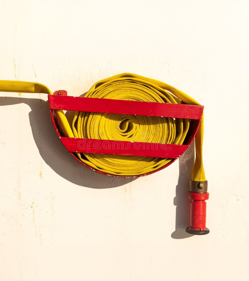 Vibrant Fire Hose stock photo. Image of background, firefighter - 340197782