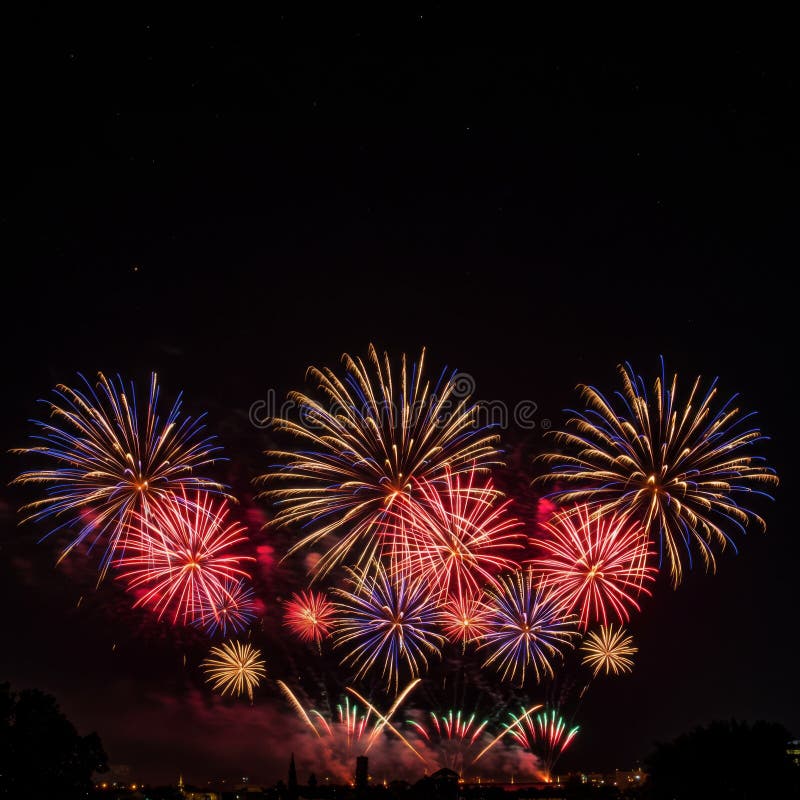 Vibrant Fireworks Illuminate the Night Sky Above a Bustling Cityscape ...