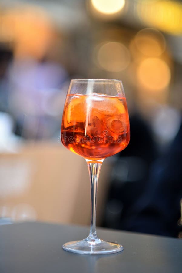 Vibrant Glass of Alcohol Positioned on a Tabletop in a Restaurant ...