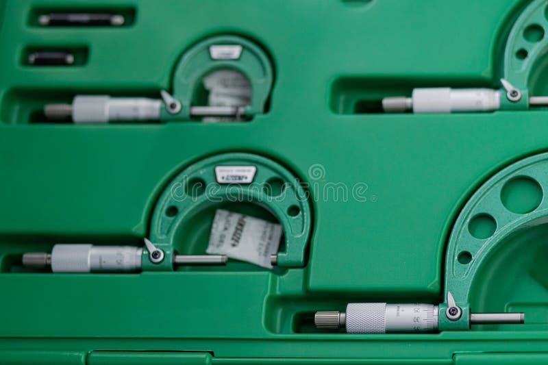Precision Measuring Tools Arranged Neatly in a Vibrant Green Case ...