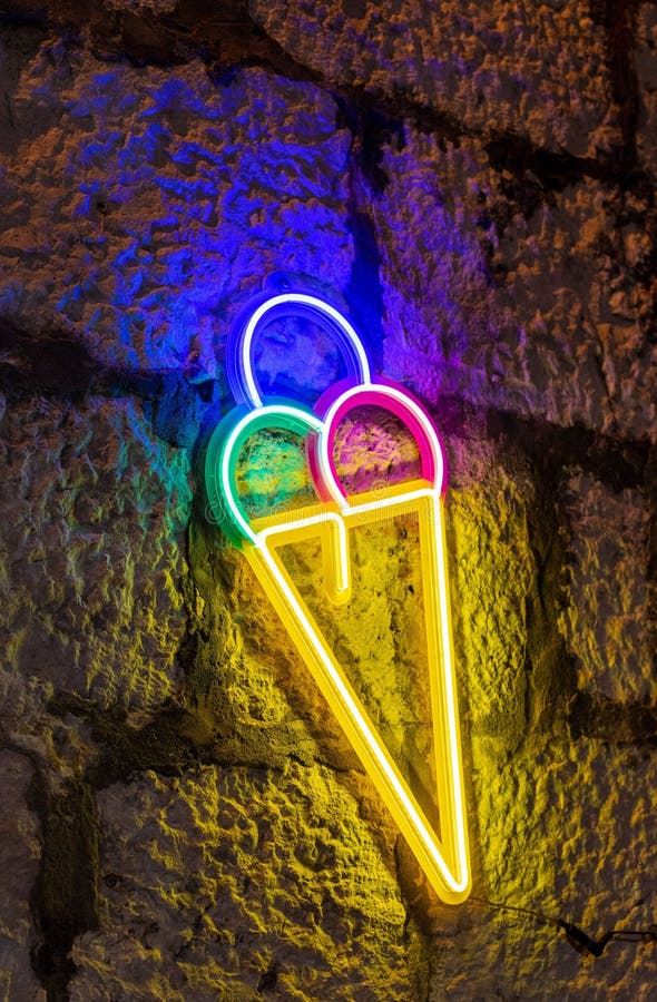 Vibrant, Illuminated Neon Sign in the Shape of an Ice Cream Cone. Stock ...