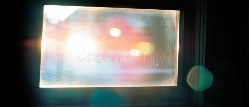 Vibrant Light Leaks Streaming through a Window Creating Bright Spots ...