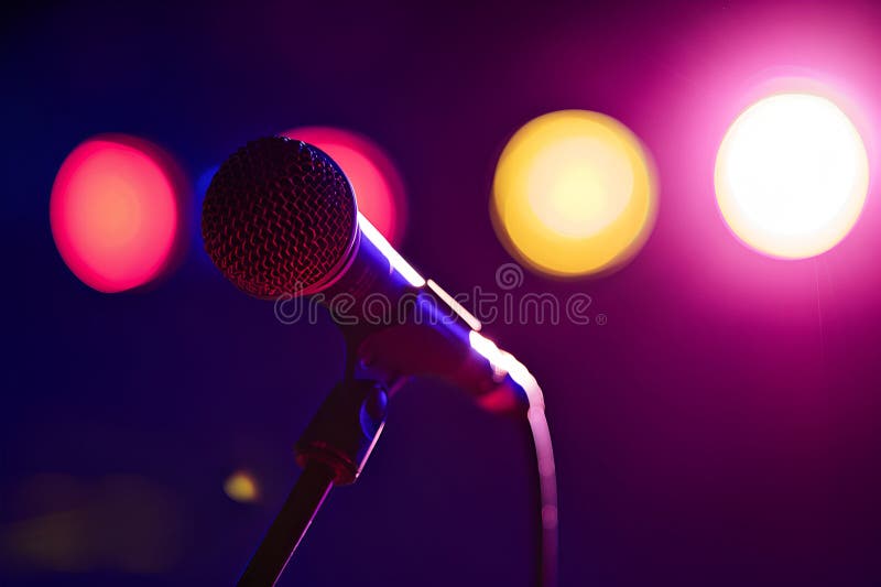 Vibrant Microphone Spotlight on Stage with Colorful Lights Stock ...