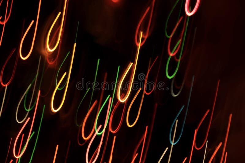 Colorful Light Trails in Abstract Patterns Against a Black Background ...