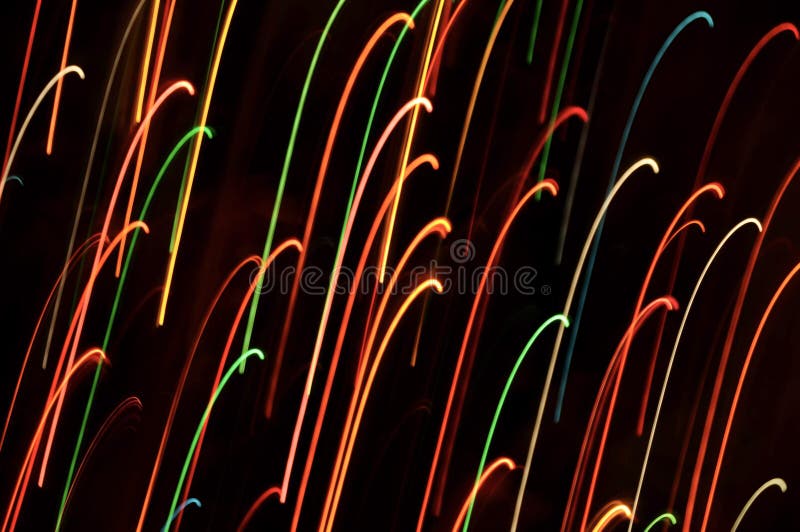 Colorful Light Trails in Abstract Patterns Against a Black Background ...