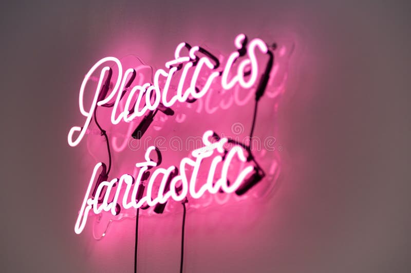 Vibrant Neon Sign Featuring the Text Plastic is Fantastic Illuminated ...