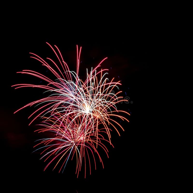 Vibrant Nighttime Display of Fireworks Exploding in the Sky Stock Photo ...
