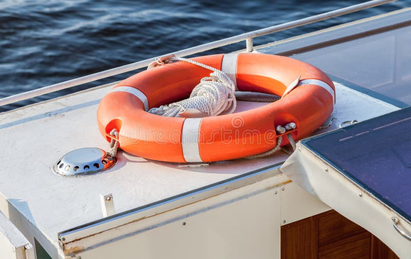 Vibrant Orange Lifebuoy on the Excursion Boat Stock Photo - Image of ...