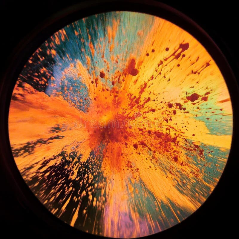 Vibrant Orange and Yellow Paint Explosion Against Dark Backdrop in ...