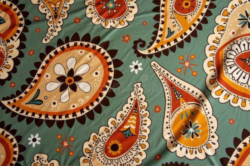 Vibrant Paisley Pattern with Floral Accents on Teal Fabric Background ...