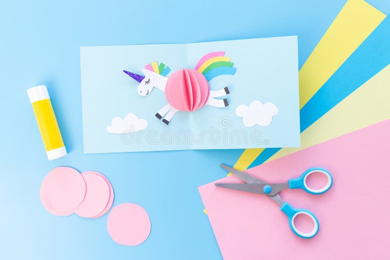 Vibrant Paper Craft Project, a White Unicorn Leaps Over Clouds ...