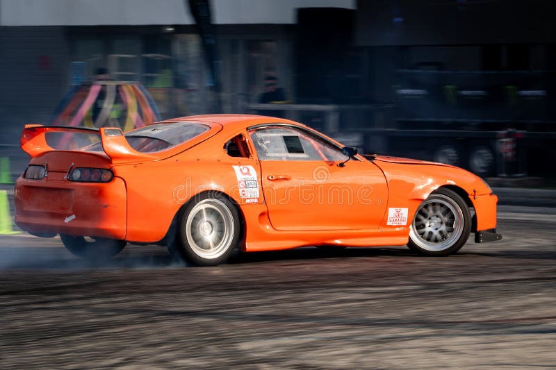 Vibrant Race Car Speeding with a Drift on the Track Editorial Stock ...
