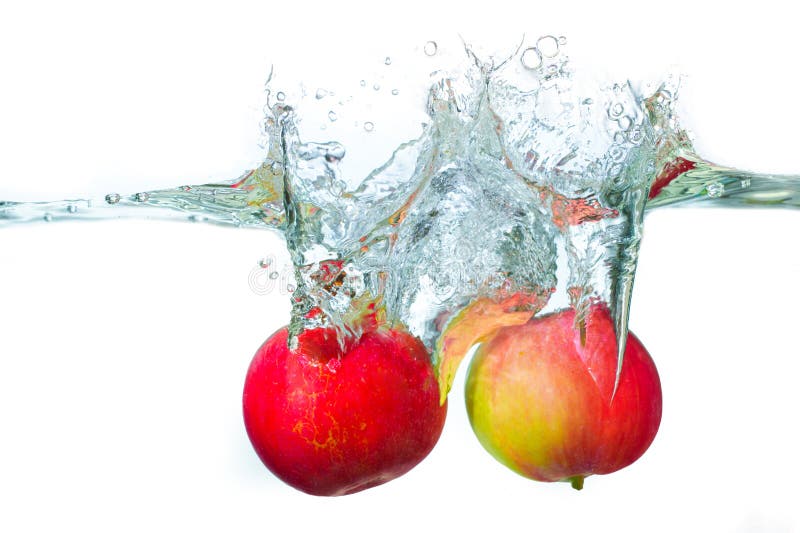 Dynamic Splash of Red Apples in Clear Water with Bubbles and Ripples Stock Photo - Image of ...