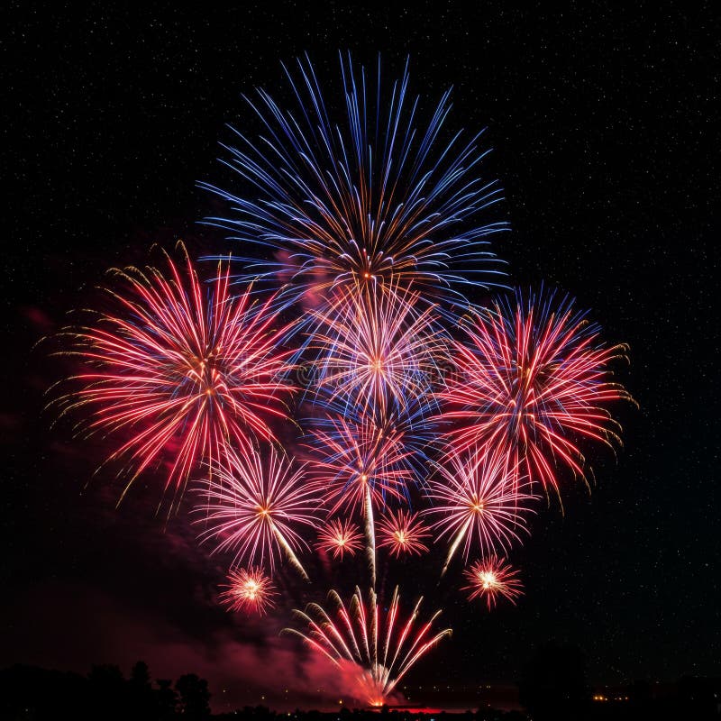 Vibrant Red Blue White Fireworks Display Against Night Sky Stock ...
