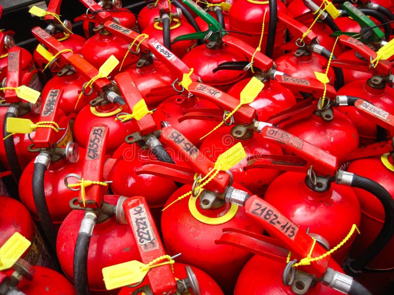 Vibrant Red Fire Extinguishers Grouped, Highlighting Safety and ...