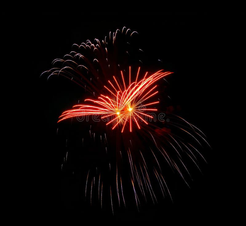 A Vibrant Red Firework Bursts Against a Dark Sky, Featuring a Spiral ...