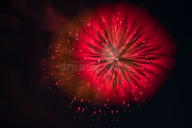 Vibrant Red Firework Exploding in the Night Sky Stock Photo - Image of ...