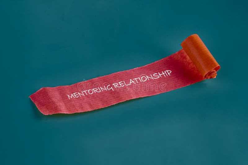 A Vibrant Red Ribbon with the Words Mentoring Relationship Elegantly ...