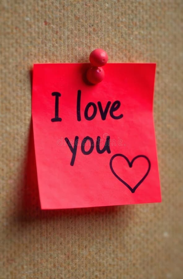 Bright Red Note with Loving Message Displayed on a Textured Board Stock ...