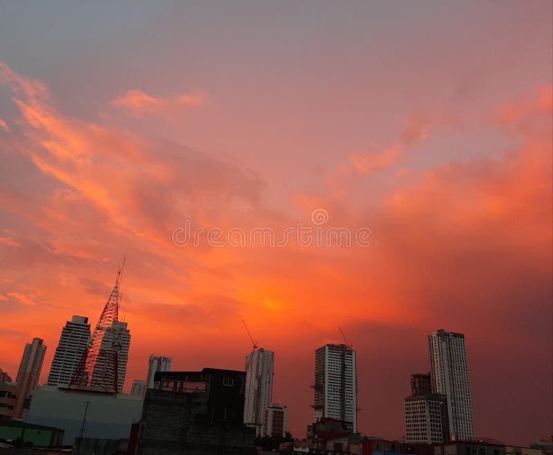 Vibrant sky in Manila stock photo. Image of tower, sunrise - 203222110