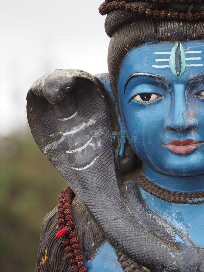 Colorful Painted Statue of a Blue Hindu Deity Stock Image - Image of ...
