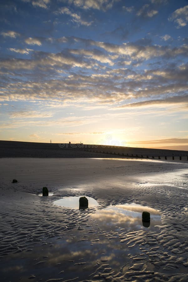 Vibrant Sunrise Landscape Reflected in Low Tide Water on Beach Stock ...