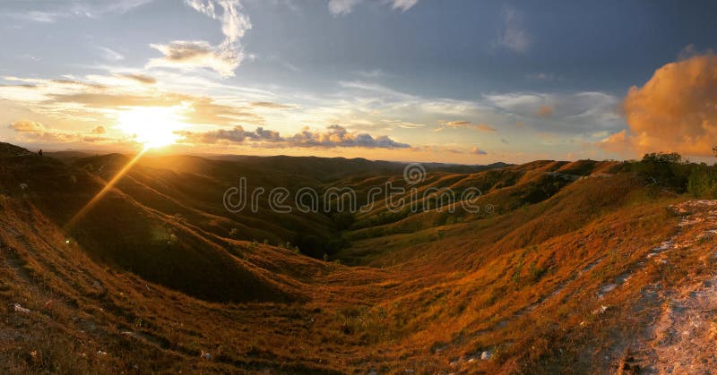 Vibrant Sunset Over Tranquil Lake with a Lone Canoe Reflecting Stunning ...