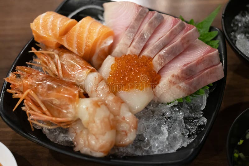 A Vibrant Sushi Platter Featuring Fresh Seafood Delicacies on Ice Stock ...