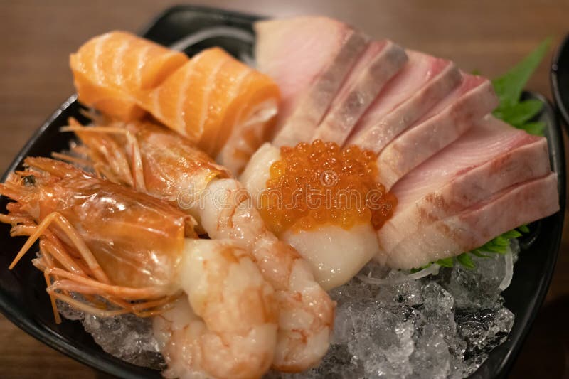 A Vibrant Sushi Platter Featuring Fresh Seafood Delicacies on Ice Stock ...