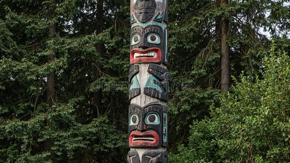 Vibrant Totem Pole Against Green Forest Backdrop Stock Illustration ...