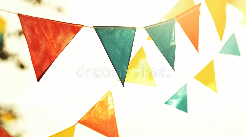 Vibrant Triangular Flags Hanging on String Displaying Festive Colors ...