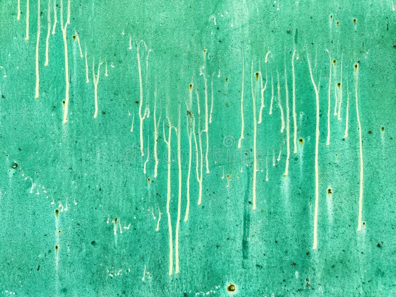 A Vibrant Turquoise Backdrop Featuring a Unique Dripping Pattern ...
