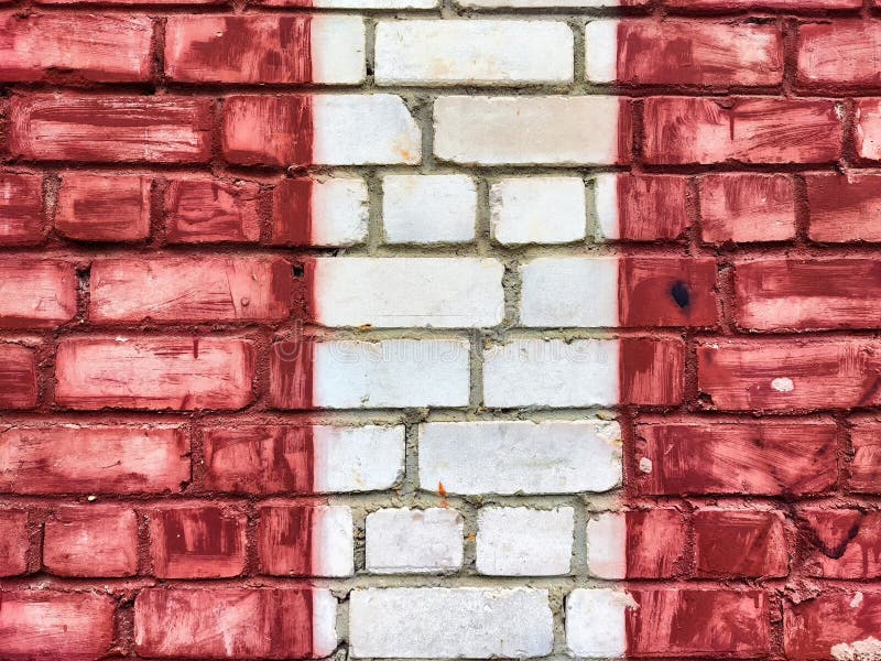 A Vibrant Wall Featuring a Mix of Red and White Bricks, Providing a ...