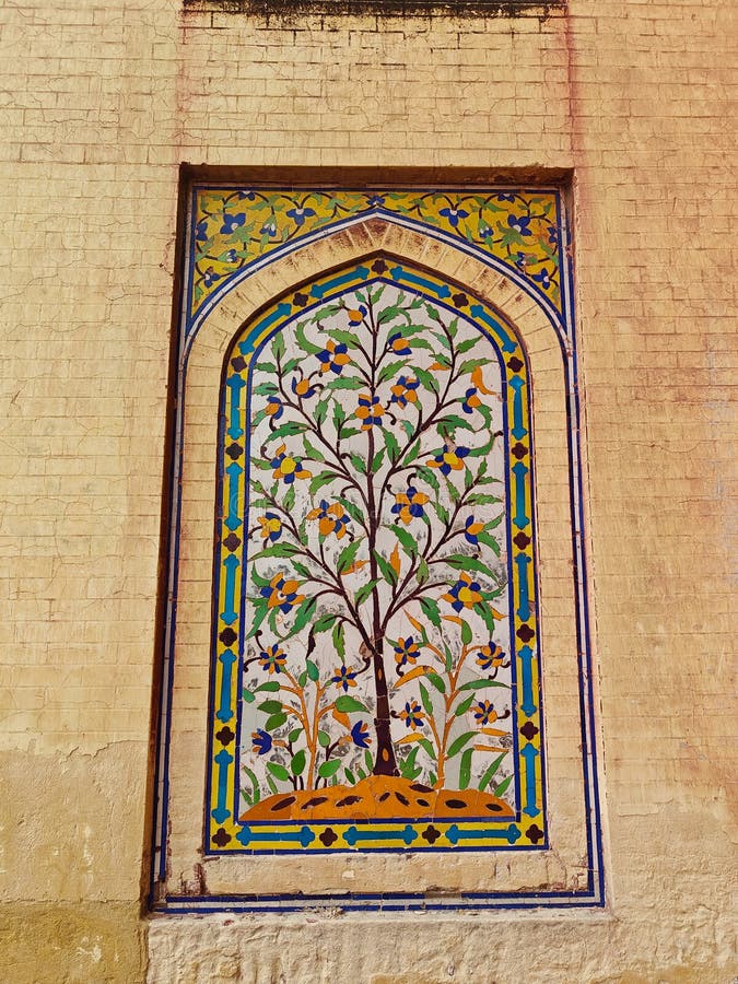 A Vibrant Wall Mural Features a Detailed Tree Design with Blossoms ...