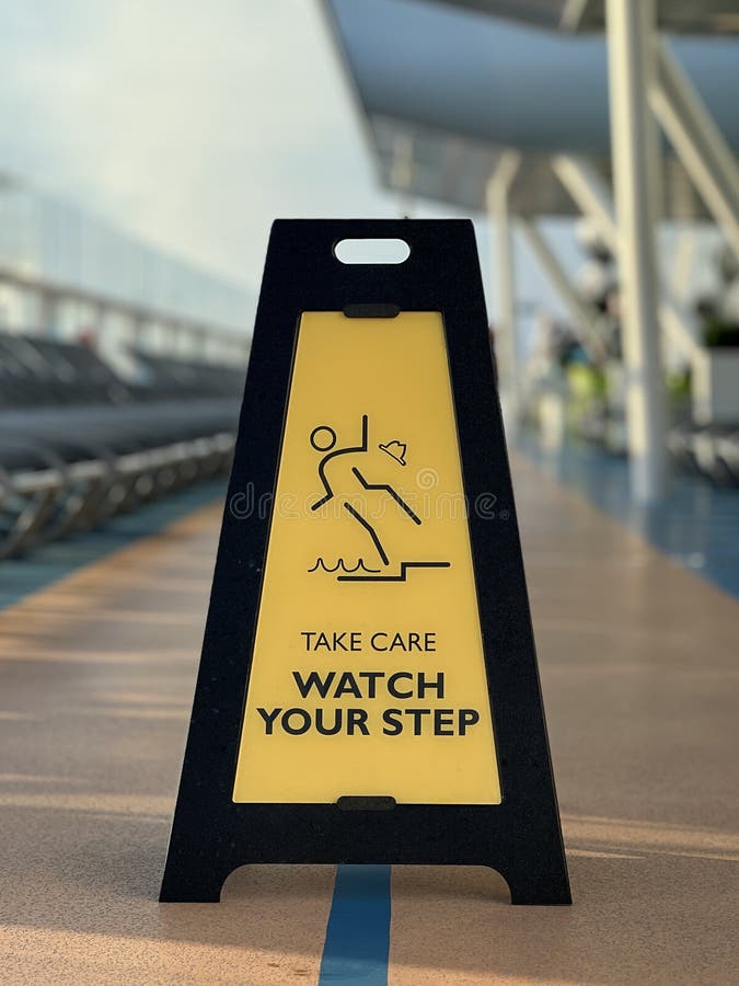 Vibrant Yellow and Black Warning Sign with the Phrase Caution - WATCH ...