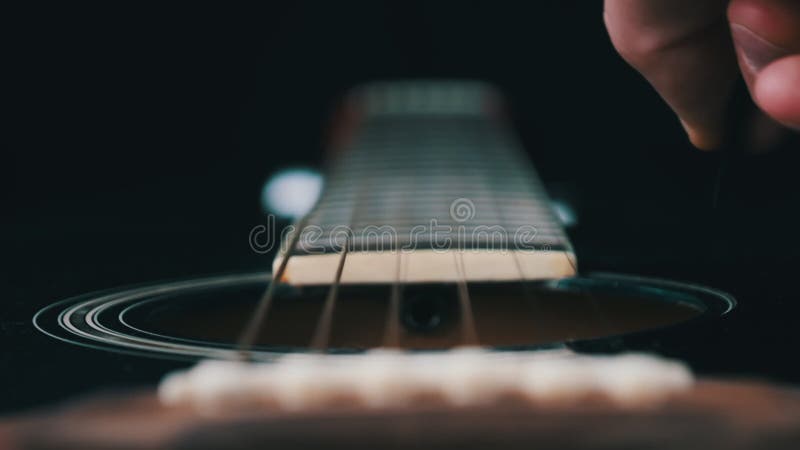 Vibration Metalic Strings on an Acoustic Guitar in Slow Motion, Close ...