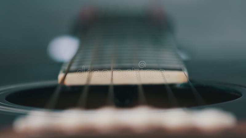 Vibration of Strings on an Acoustic Guitar in Slow Motion, Close-Up ...