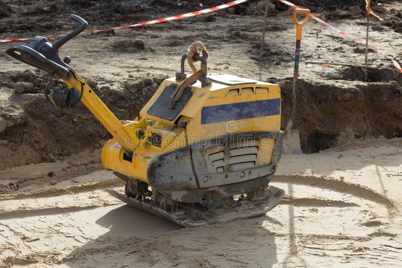 Vibratory plate compactors stock photo. Image of professional - 139415180