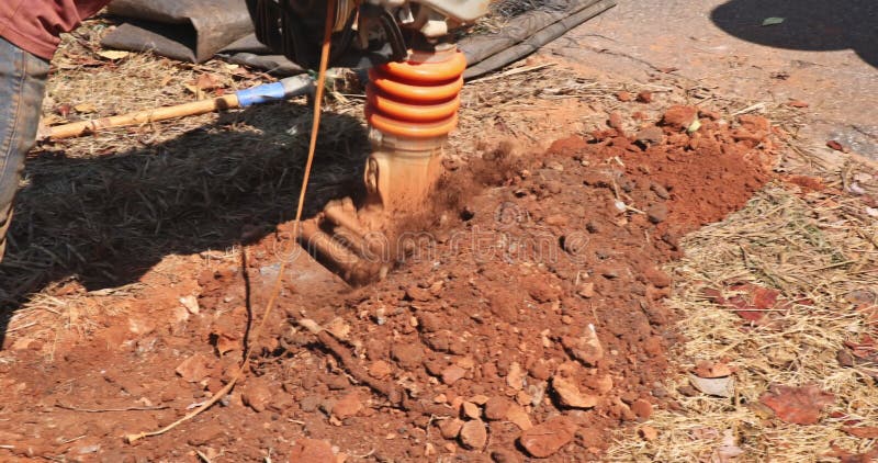 The Vibratory Plate of the Tamping Machine Compactor Tool Jumps As a ...