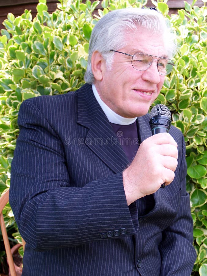 Vicar giving sermon stock photo. Image of devote, garden - 2581888