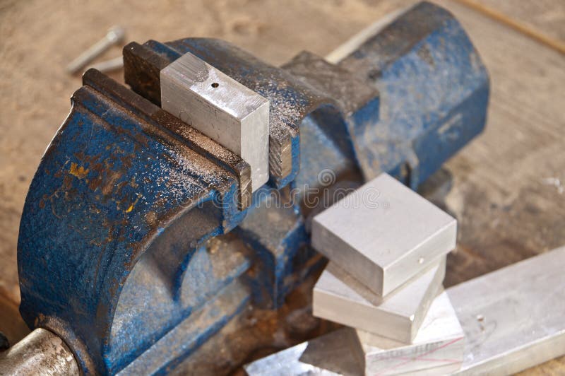 Vice with a block of metal stock photo. Image of vice - 23892712