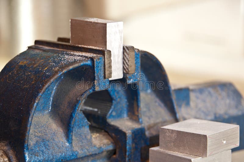 Vice with a block of metal stock image. Image of bench - 24101345