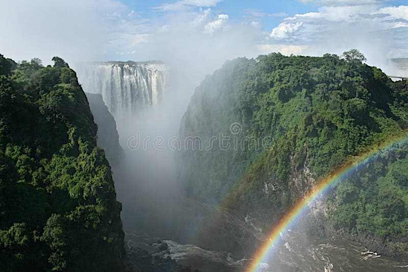 Victoria Falls with Rainbow Stock Photo - Image of zambia, rainbow ...