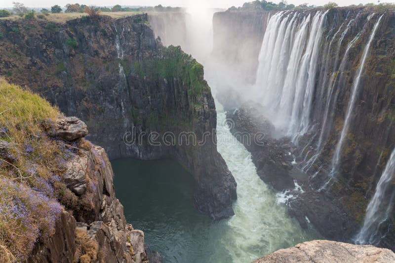 Victoria Falls from Zambia Side at Dusk, Rocks in the Foreground Stock ...