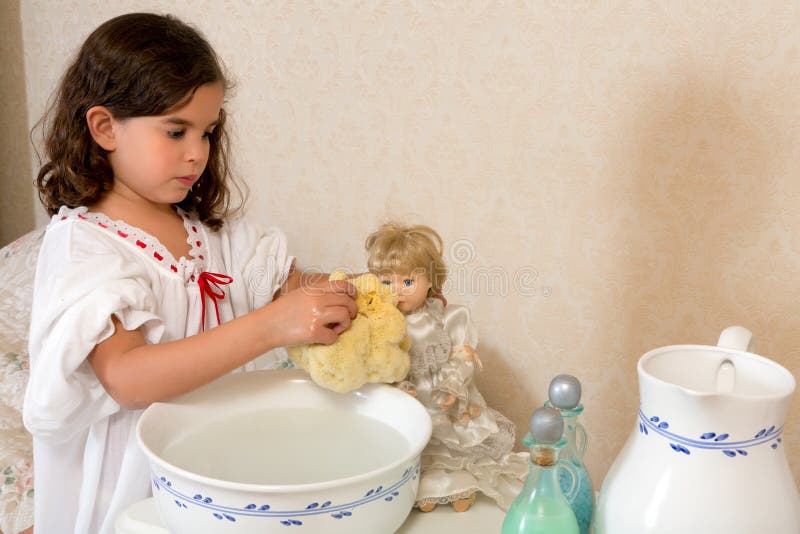 Victorian Girl Washing Doll Stock Image - Image of 1900, portrait: 38094031