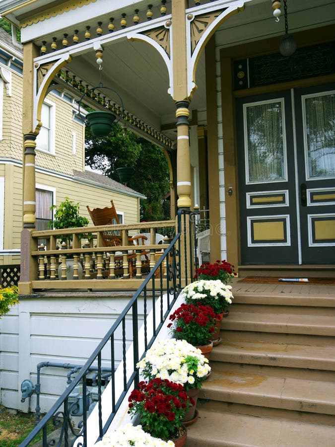 Victorian House with Red and White Flower Pots Stock Image - Image of ...